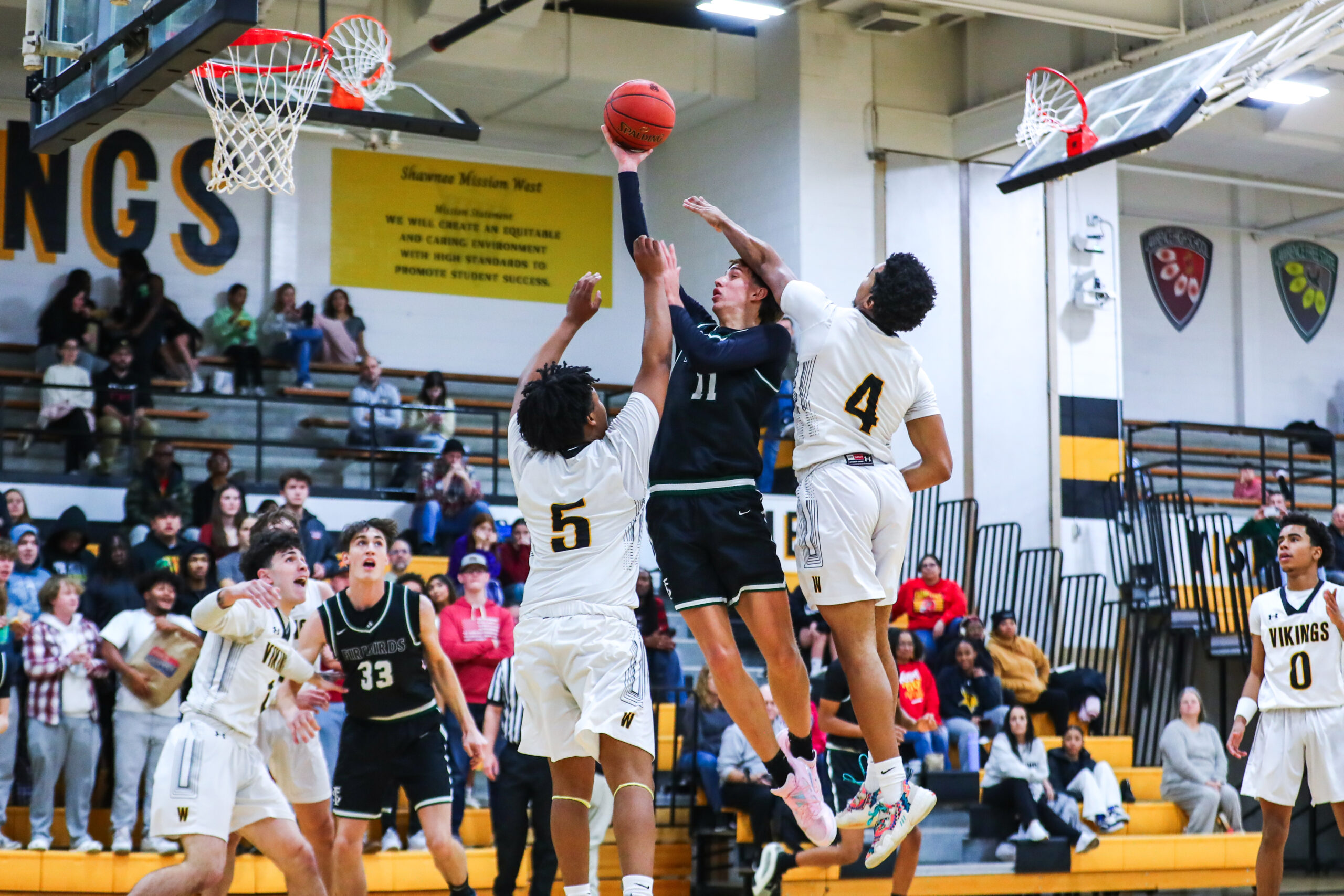Free State girls, boys basketball split doubleheader at Shawnee Mission ...
